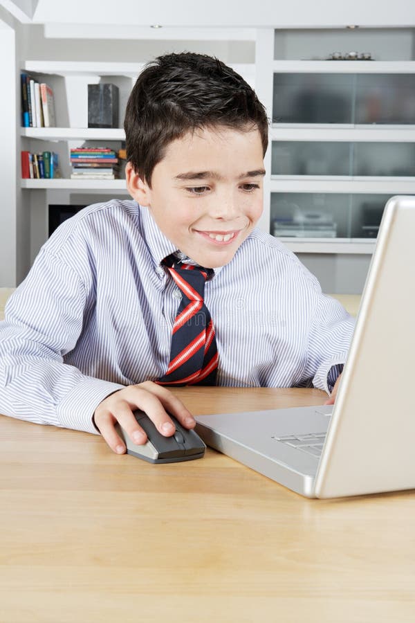Kid with Laptop at Home stock photo. Image of mouse, focus - 28941826
