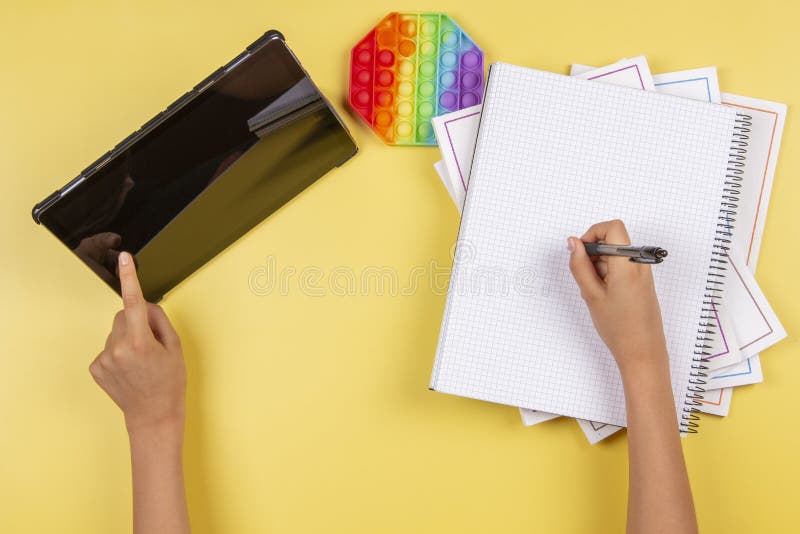 Kid Learning, Doing Homework, Using Tablet Computer. School Books and ...