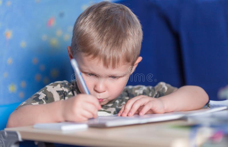 Kid learning to write stock photo. Image of education - 60184558