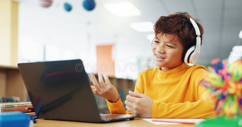 Kid, Library and Headphones with Laptop for Video Call, E Learning or ...