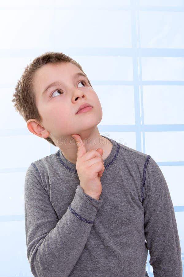 Kid Looking Up Thinking stock photo. Image of gesturing - 33998116