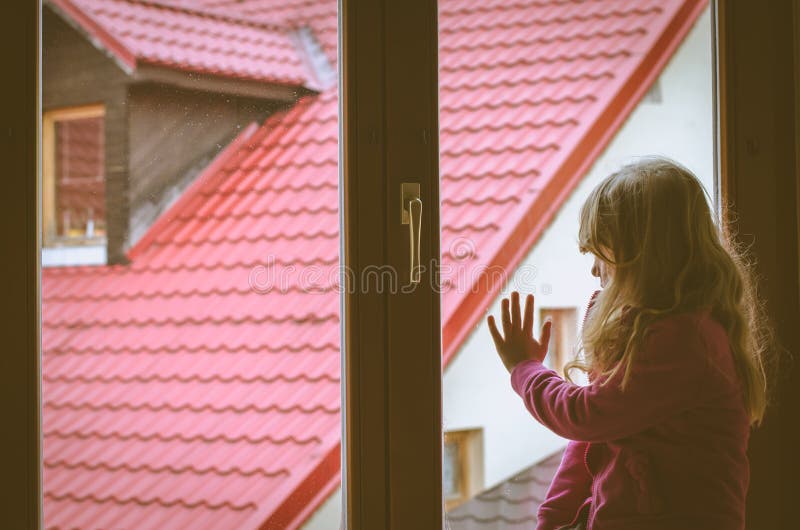Kid looking through window stock image. Image of hope - 70091341