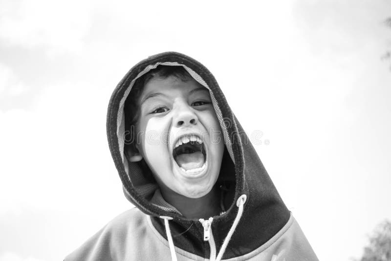 Kid Making Strange Facial Expressions Stock Photo - Image of surprised ...