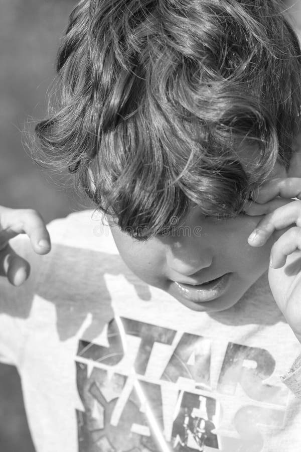 Kid Making Strange Facial Expressions Stock Photo - Image of swollen ...