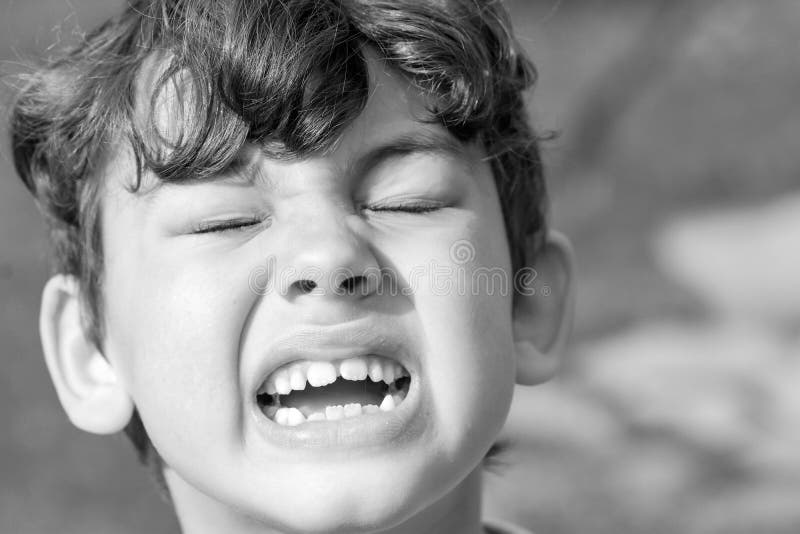 Kid Making Strange Facial Expressions Stock Image - Image of playing ...