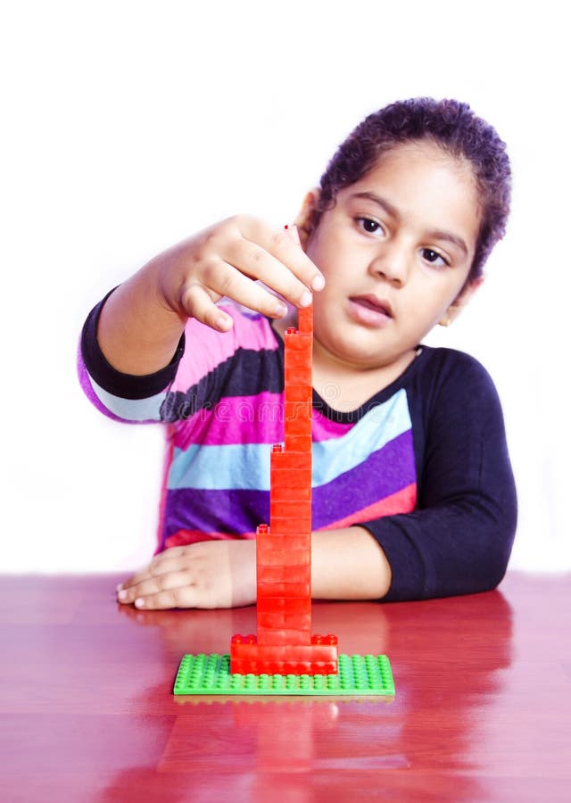Kid Making Tower with Blocks Stock Image - Image of hand, task: 21959519