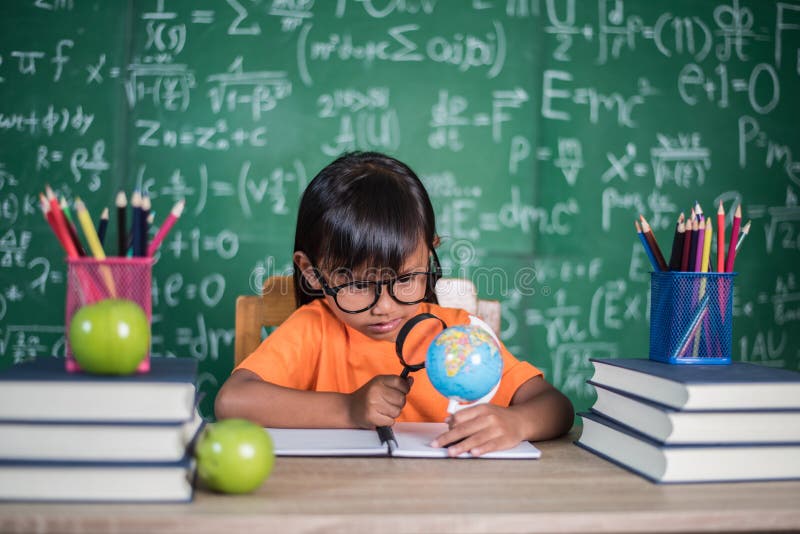 Kid Observing or Studying Educational Globe Model Stock Image - Image ...