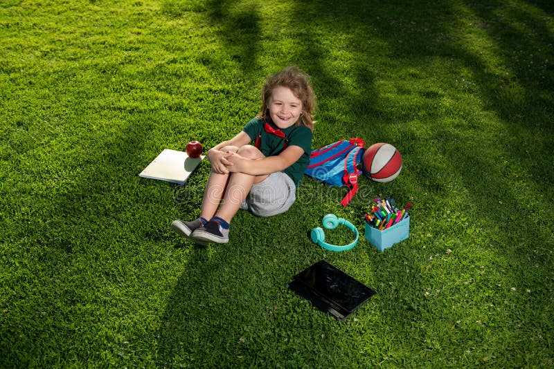 Kid Outdoor Education. Child Doing Homework Outdoor. Stock Photo ...