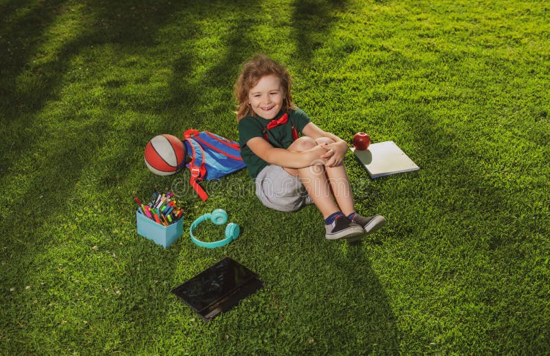 Kid Outdoor Education. Child Doing Homework Outdoor. Stock Photo ...