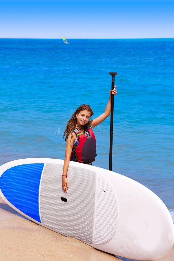 Kid Paddle Surf Surfer Girl with Row in the Beach Stock Image - Image ...