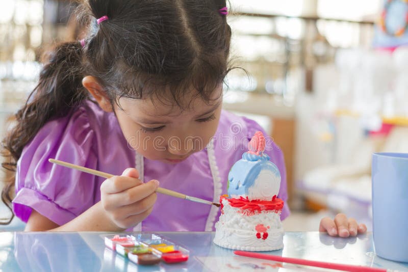 Kid Painting Color on the Plaster Statue Stock Image - Image of ...