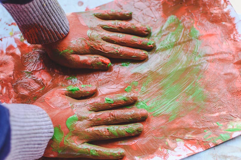 Kid painting with hands stock photo. Image of happy - 177158372