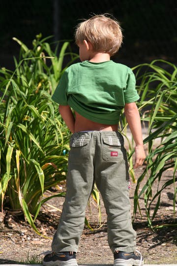 Kid pee stock image. Image of funny, head, grass, urinating - 699337