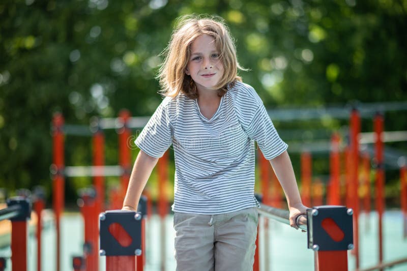 Kid Performing a Bodyweight Exercise for the Upper Body Stock Photo ...
