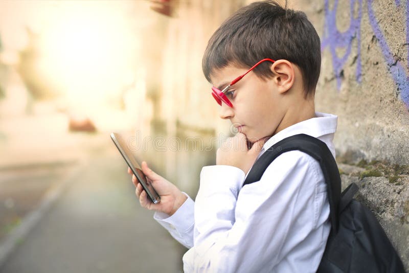 Kid with phone stock image. Image of grow, education - 71278707