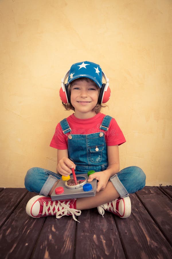 Kid pilot playing at home stock photo. Image of success - 60392842