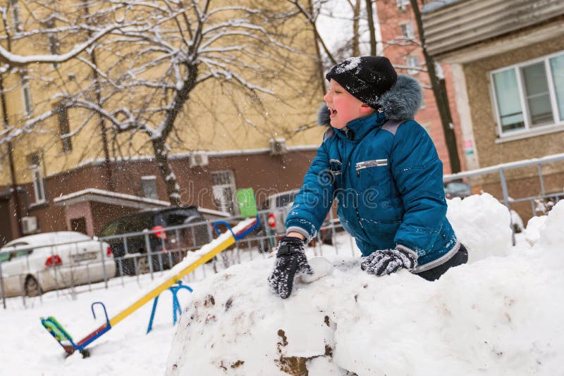 Kid Play Snowballs in Snow Fortress Stock Image - Image of hands ...