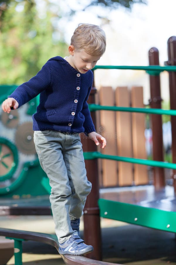 Kid at the playground stock photo. Image of laughing - 47719116