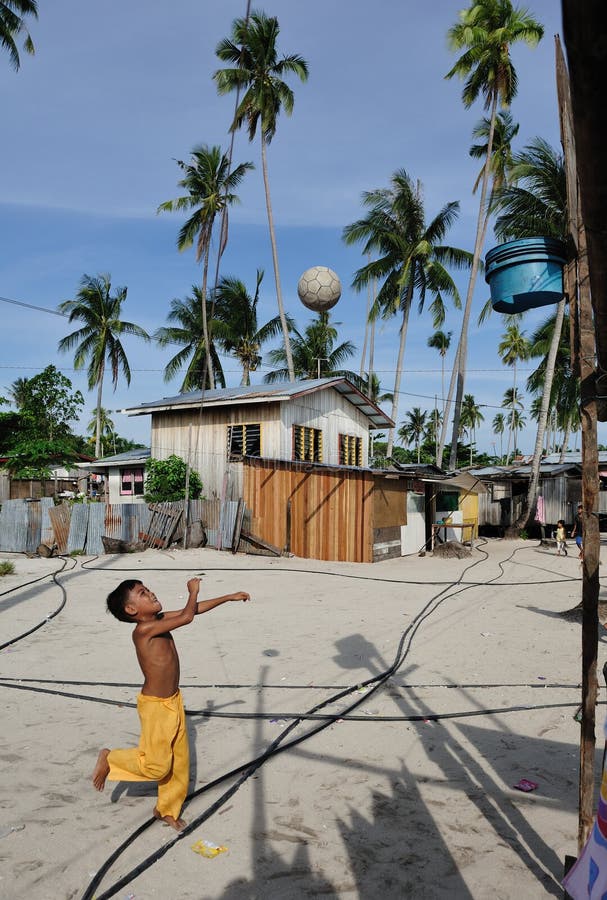 A kid playing basket ball editorial stock image. Image of ball - 29192774