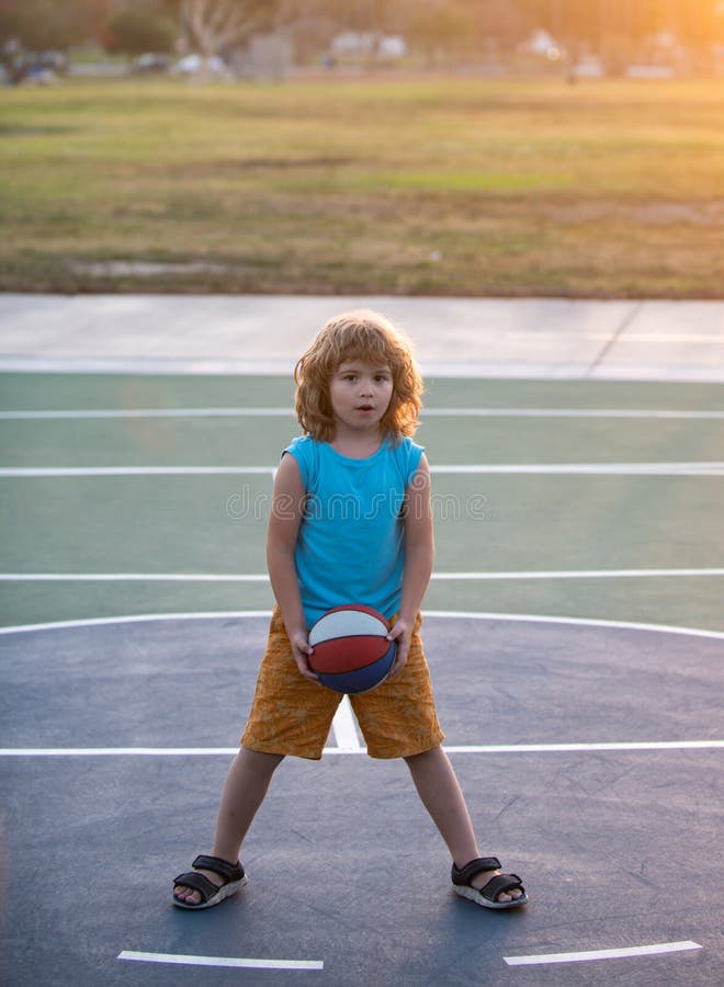 Kid Playing Basketball. Activity and Sport for Kids. Stock Photo ...