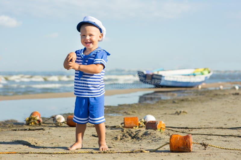 Kid playing on beach stock photo. Image of beach, young - 76355096