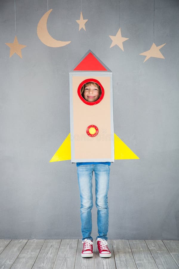Kid Playing with Cardboard Toy Rocket Stock Image - Image of planet ...