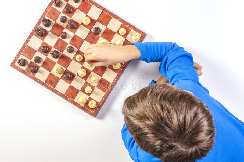 Kid Playing Chess Game on Chessboard. Top View Stock Photo - Image of ...