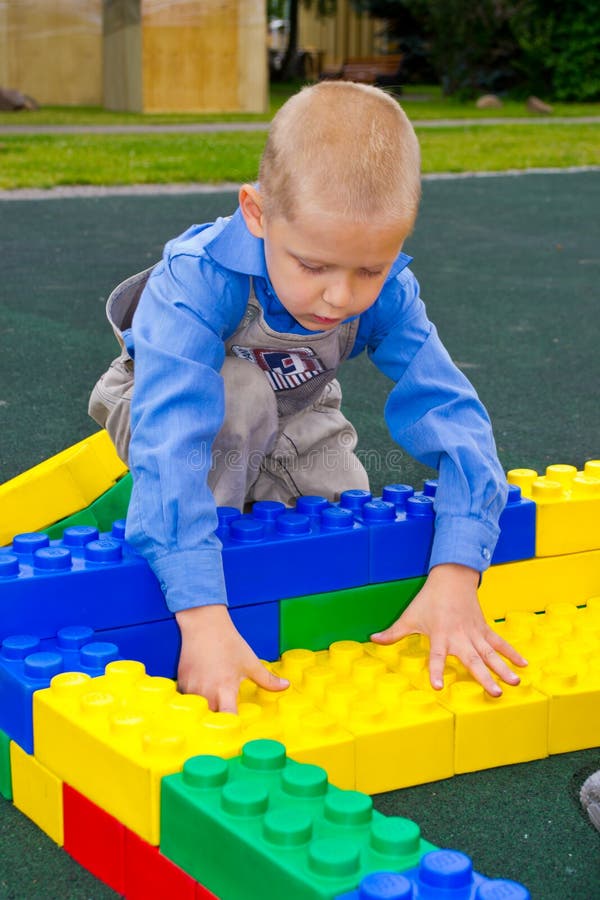 Kid playing with cubes stock image. Image of activities - 41664347