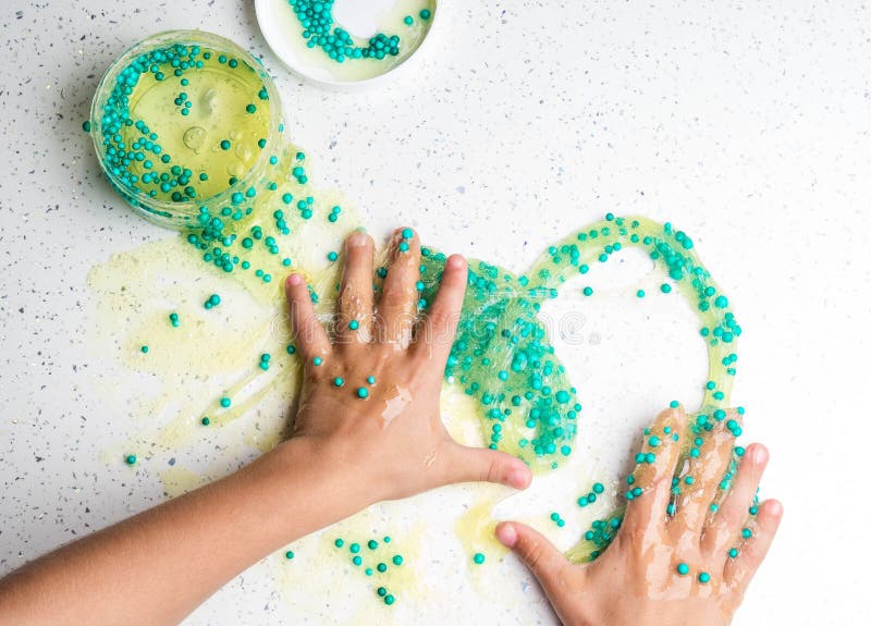 The Child Playing Slime in Happy Time, Selective Focus Stock Photo ...