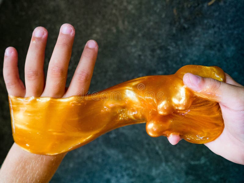 The Child Playing Slime in Happy Time, Selective Focus Stock Photo ...