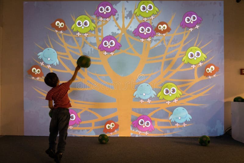 Kid Playing Interactive Game Projected To the Wall Editorial ...