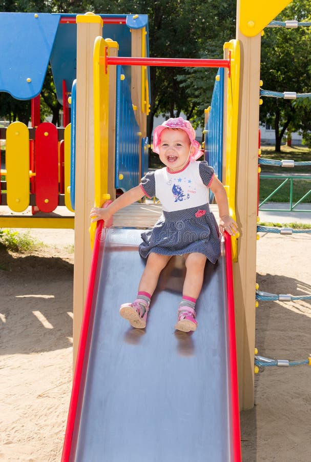 The Kid is Playing on the Playground Stock Image - Image of outdoor ...