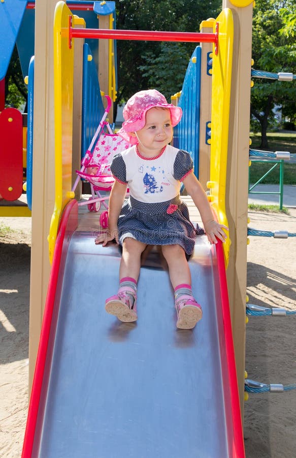 The Kid is Playing on the Playground Stock Image - Image of face ...