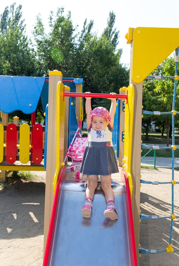 The Kid is Playing on the Playground Stock Image - Image of happy, play ...