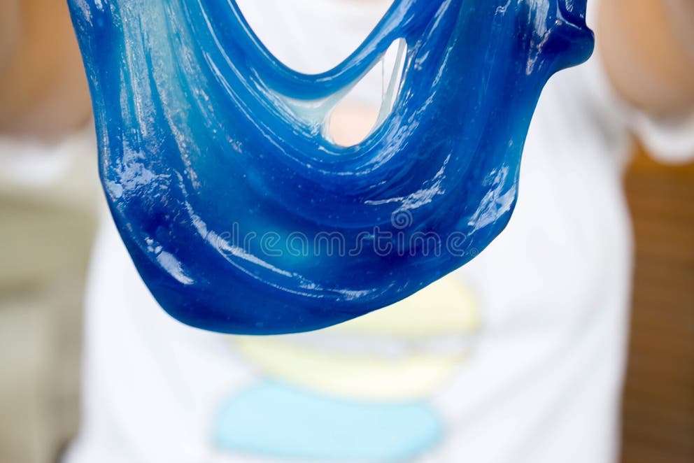 Kid playing slime stock image. Image of blue, happy, playing - 85669257