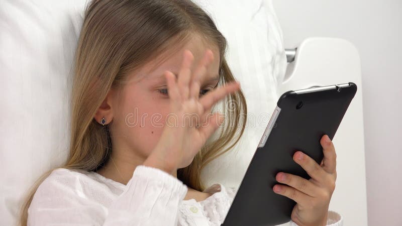 Kid Playing Tablet in Bed, Child Browsing Internet on Touchscreen ...