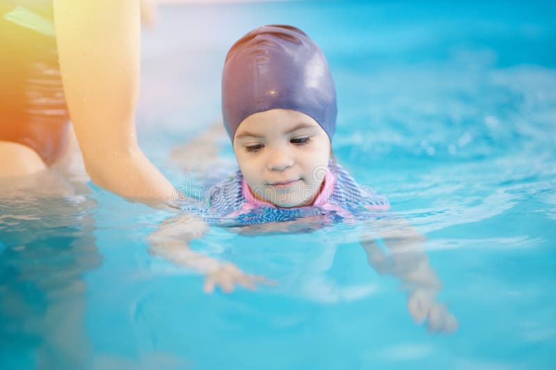 Kid Playing in Water and Learning To Swim Stock Photo - Image of pool ...