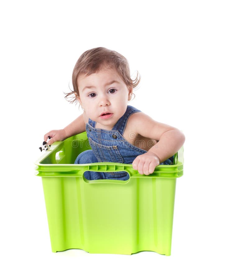 Kid plays with container stock photo. Image of isolated - 89919456