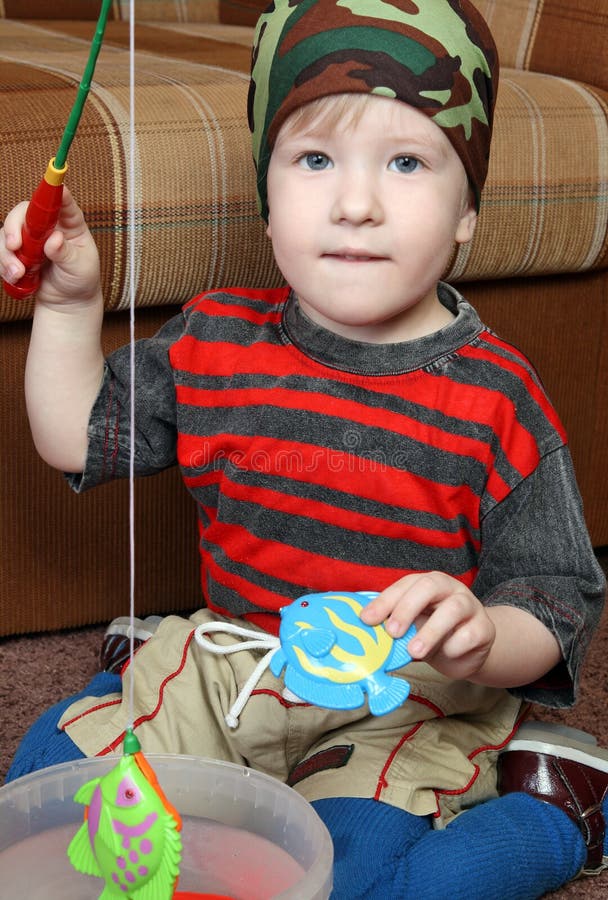 Kid plays in fishing stock photo. Image of smile, toys - 13141782