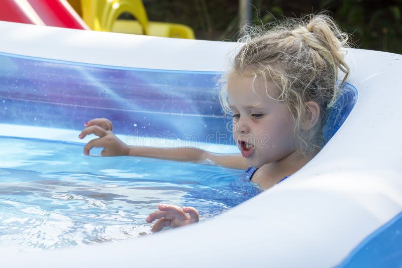 Kid in pool stock image. Image of skin, game, hair, blond - 58185957