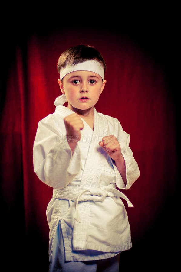 Kid practicing karate stock photo. Image of portrait - 70158716
