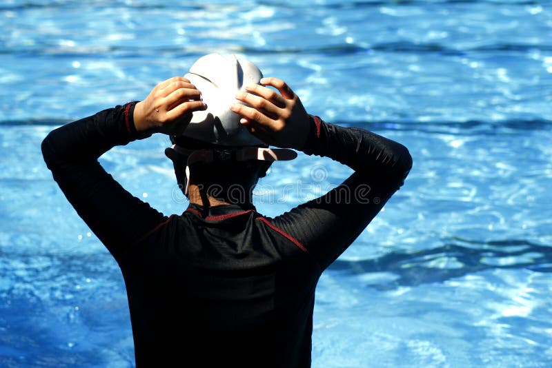 Kid Prepares To Swim in a Swimming Pool. Stock Image - Image of diving ...