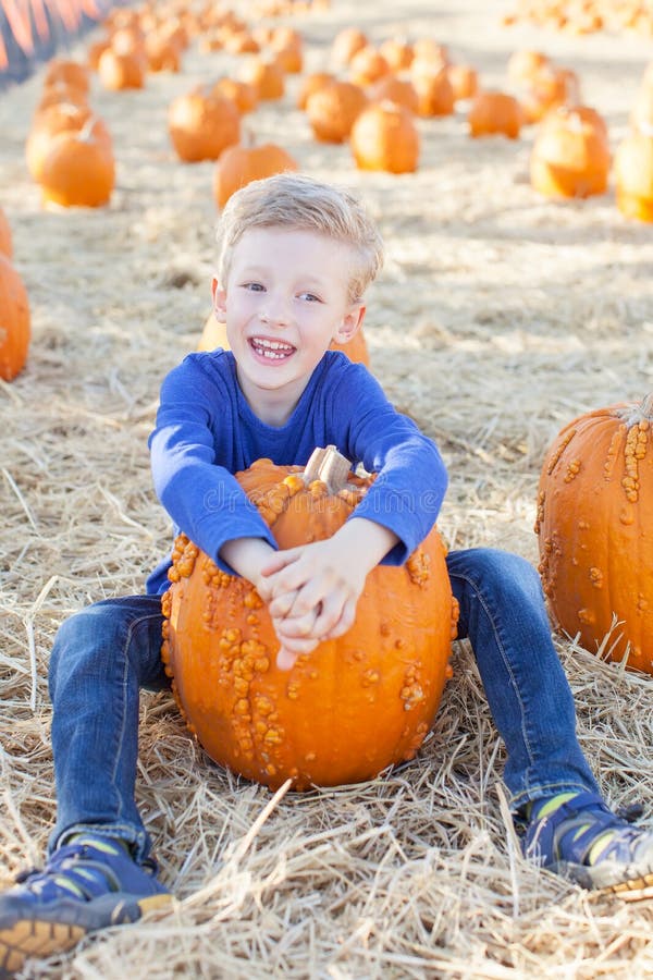 Kid at pumpkin patch stock image. Image of child, beautiful - 61247607
