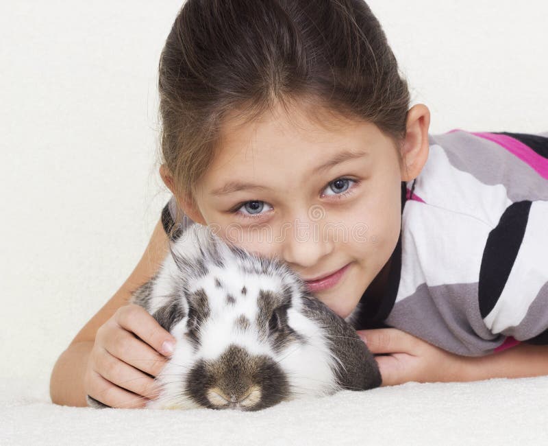 Kid and rabbit stock photo. Image of childhood, beautiful - 48524992