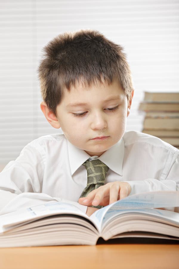 Kid reading book stock photo. Image of necktie, caucasian - 26461732