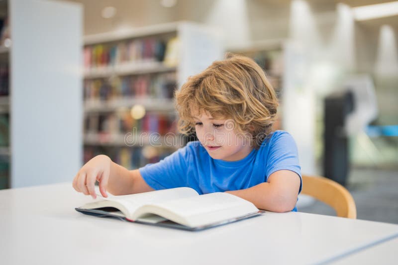 Kid Reading Book. Child Reading Book in a Public Library. Kids Early ...