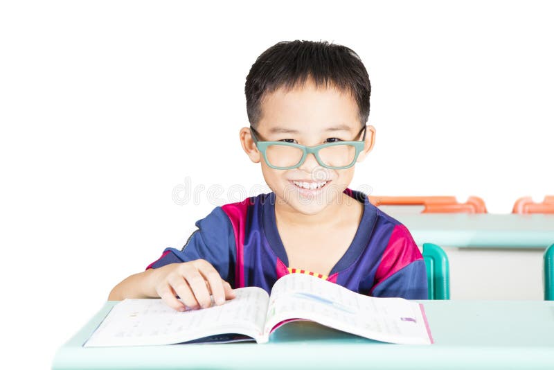 Kid Reading Book in Classroom Stock Photo - Image of glasses, paper ...