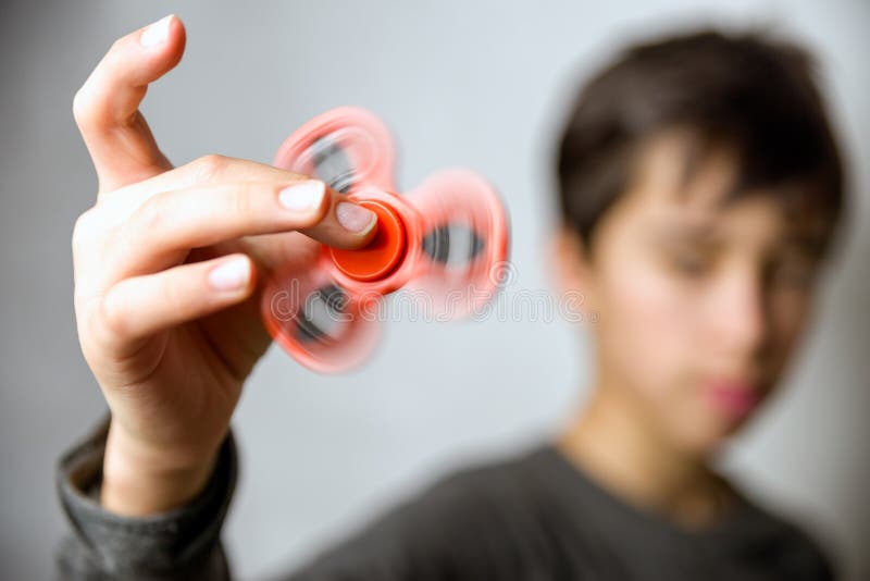 Kid with Fidget Spinner in Hand Stock Image - Image of spinner ...