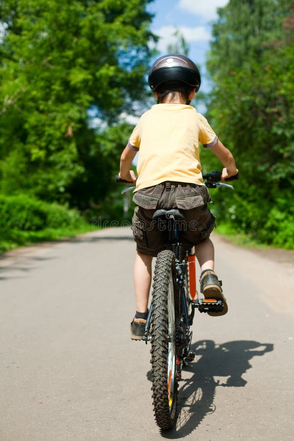 Kid riding bicycle stock image. Image of recreation, learn - 9964175