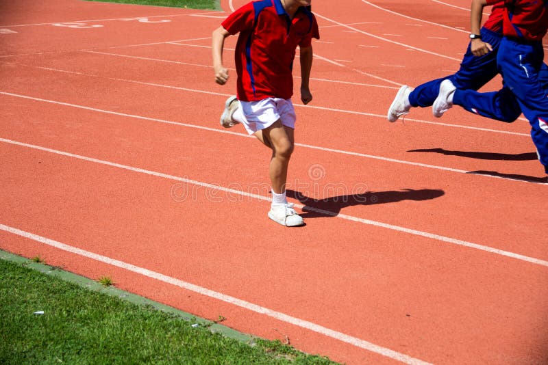 Kid Runing on Track in the Stadium Stock Image - Image of active ...